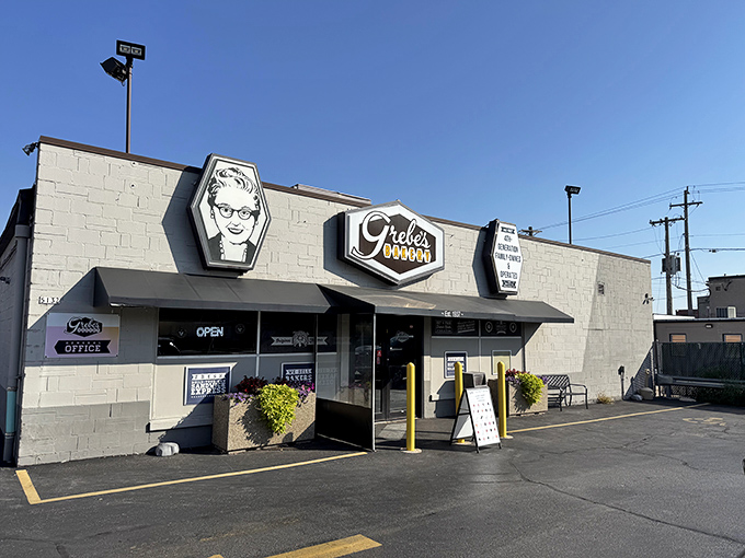 The unassuming exterior of Grebe's Bakery stands like a beacon of hope for carb enthusiasts everywhere. Wisconsin's donut paradise awaits behind these doors.