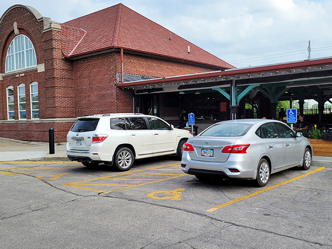 The historic brick facade of Cornbred Barbecue stands proudly in Ames, its arched windows and distinctive signage beckoning hungry travelers like a barbecue lighthouse on Main Street.