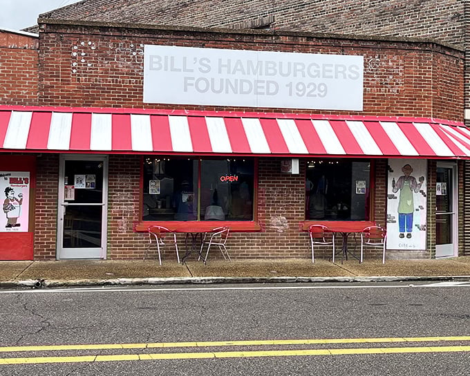 Bill's Hamburgers stands proudly since 1929, its red and white awning like a beacon calling hungry travelers home to burger paradise.