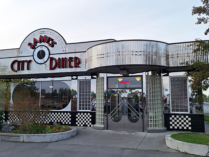 The gleaming stainless steel exterior of Sami's City Diner stands as a chrome-plated time machine, beckoning hungry travelers with its unmistakable 1950s charm.