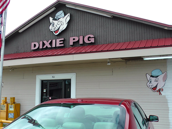 The winking pig in the blue hat says it all &ndash; this unassuming building houses barbecue magic that's been perfected since 1923. 