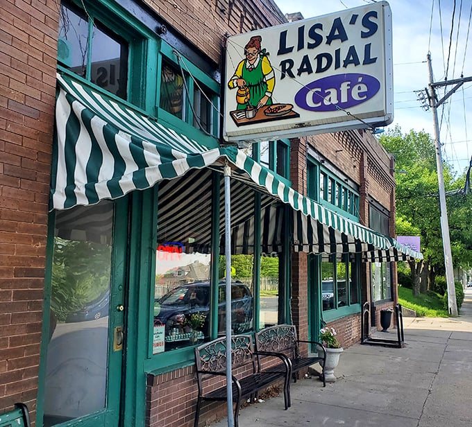 The iconic green-trimmed storefront of Lisa's Radial Cafe stands as a beacon of breakfast hope on this Omaha corner. Those striped awnings practically whisper "come hungry."
