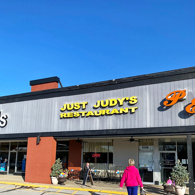 The yellow sign beckons like a lighthouse for the breakfast-starved. Just Judy's unpretentious exterior promises what fancy brunch spots often forget: actual satisfaction.