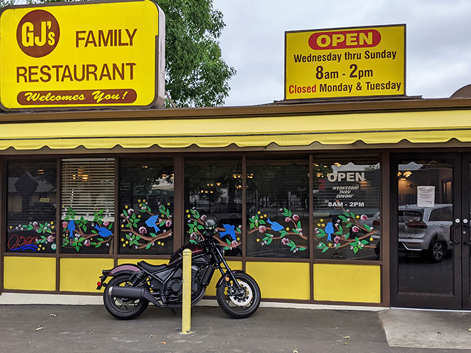 Local flavor meets roadside charm at GJ's, where the cheerful exterior and hand-painted windows showcase Eugene's love for both hearty breakfasts and Duck football.