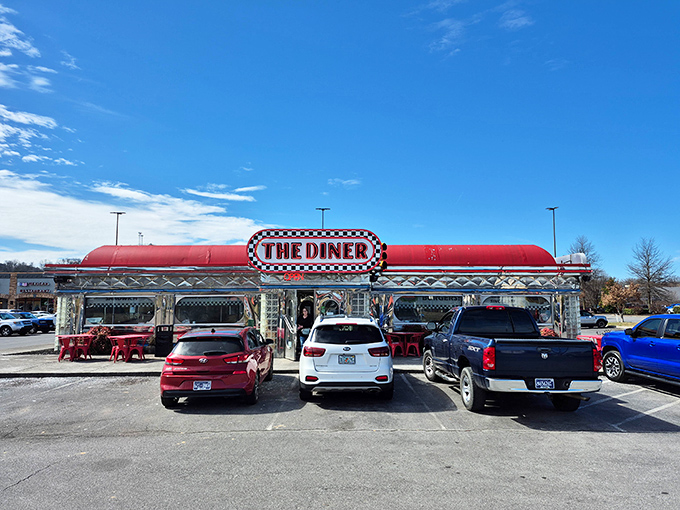 Classic Americana in all its chrome-trimmed glory! THE DINER's red-and-checkered exterior stands proudly against Tennessee's blue skies, like a time capsule you can actually eat in.