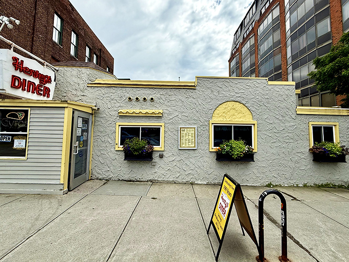 Yellow trim frames this unassuming breakfast institution, where flower boxes add a touch of charm to serious pancake business.