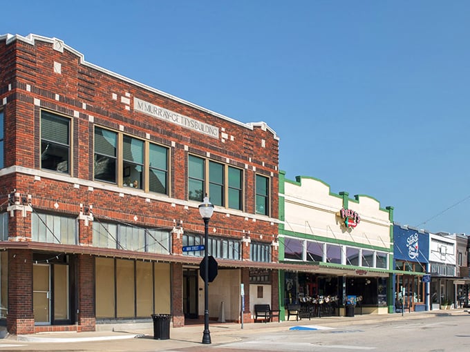 Historic brick storefronts stand sentinel on Decatur's Main Street, their weathered facades telling stories of commerce that span generations.