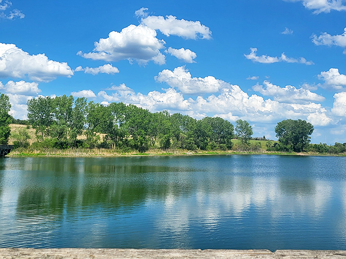 Mirror-like waters reflect Nebraska's big sky country, proving that "flyover states" have scenery worth landing for.