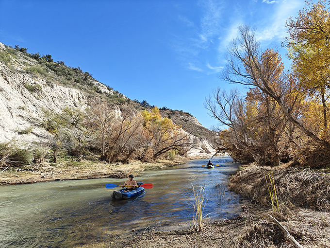 Kayaking the Verde River feels like drifting through a painting &ndash; autumn colors frame the gentle current while limestone cliffs stand guard overhead.