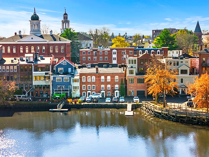Fall in Exeter paints the town in a palette that would make Bob Ross weep with joy, reflecting perfectly in the tranquil river.