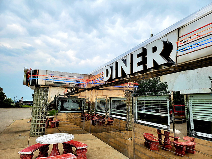 Chrome so bright you might need sunglasses! The Route 66 Diner's gleaming exterior promises a time-traveling feast for both eyes and stomach.