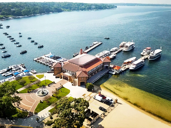 The Riviera building stands as Lake Geneva's crown jewel, where boats dock and memories are made. A century of summer stories started right here.