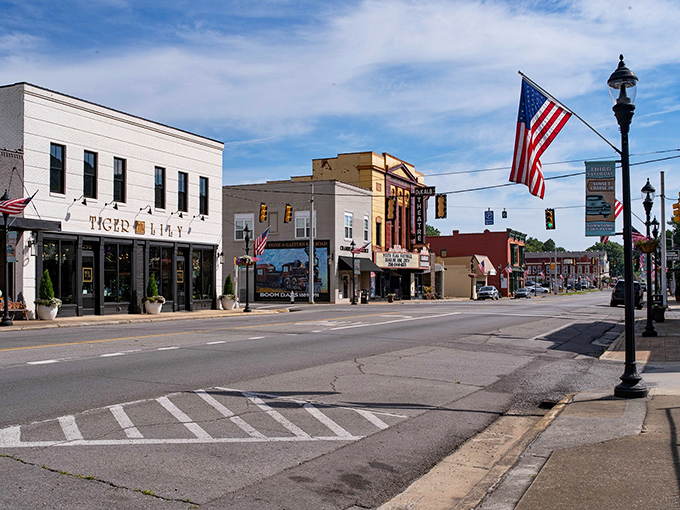American flags flutter proudly along Fort Payne's main thoroughfare, where locally-owned shops have replaced big box anonymity with neighborly hellos.