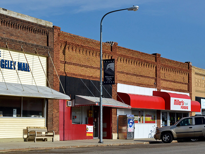 Downtown storefronts with character you can't manufacture &ndash; where the awnings aren't for show and the bench out front invites actual sitting.