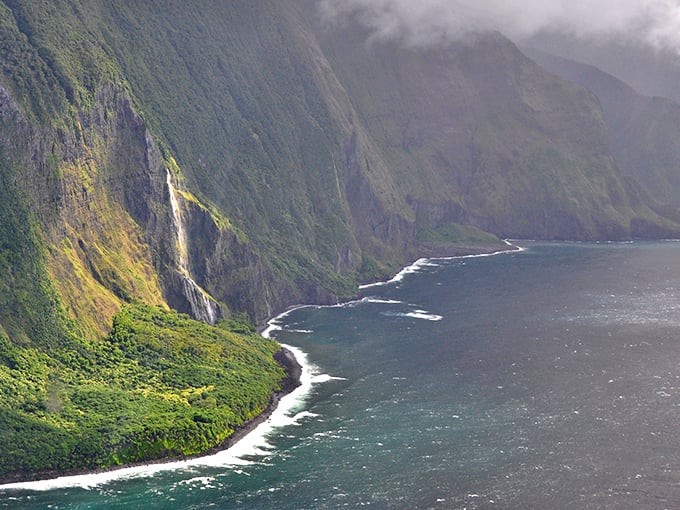 Nature's skyscrapers meet the sea along Molokaʻi's north shore, where waterfalls cascade down some of the world's tallest sea cliffs.