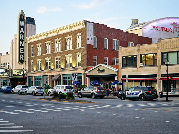 The Warner Theatre's iconic vertical sign has been guiding locals to entertainment since the Great Depression—much like your Social Security check guides monthly budgeting.