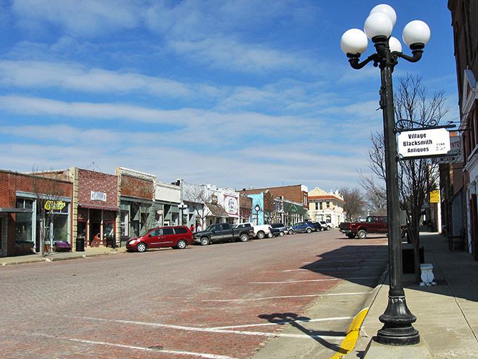 Brick storefronts with vintage charm line Walnut's main street, where colorful window displays beckon treasure hunters like sirens calling to sailors. 