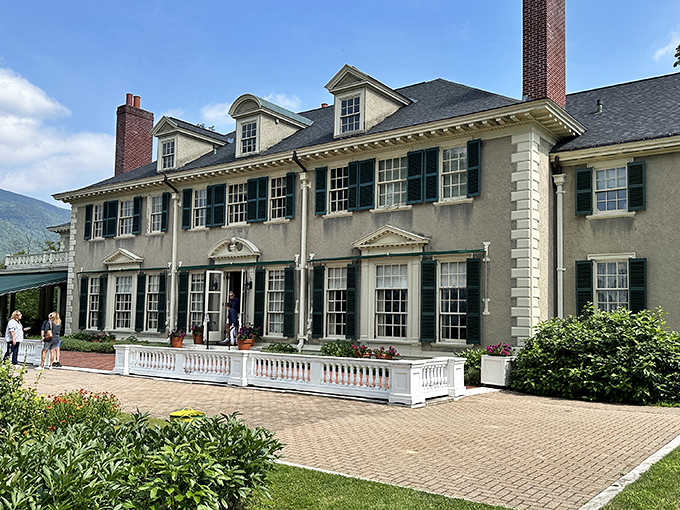 The grand façade of Hildene stands proudly against Vermont's mountains, like a Georgian revival postcard come gloriously to life.