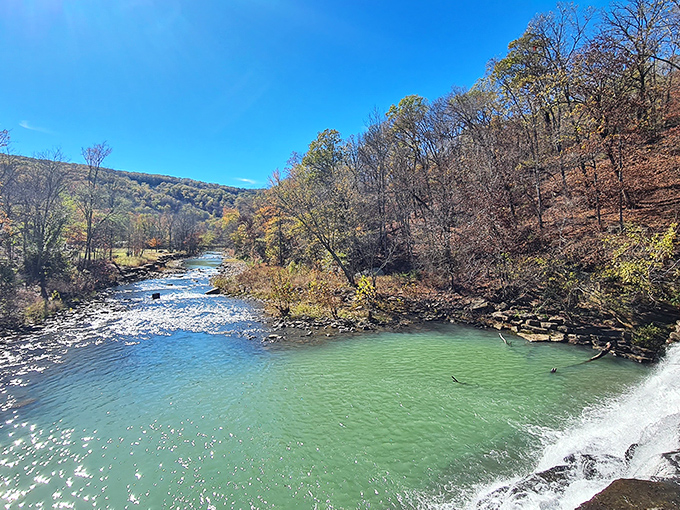 Nature's perfect swimming hole awaits at Lee Creek. The emerald waters and layered rock formations create Arkansas' version of a five-star resort&mdash;minus the overpriced cocktails.