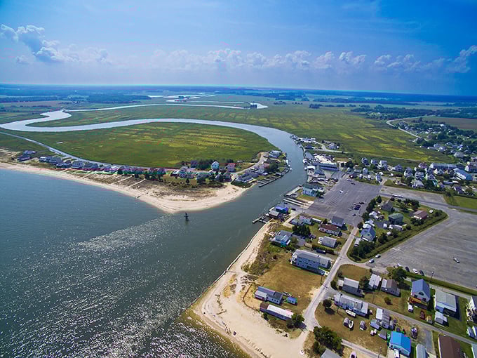 Aerial view of Bowers Beach's pristine shoreline. Houses line up like eager theatergoers with front-row seats to nature's daily performance of tides and sunlight.