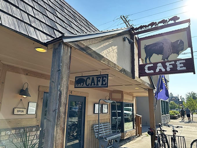 The iconic buffalo sign beckons hungry travelers like a breakfast lighthouse. This rustic wooden exterior with its weathered charm promises Montana hospitality inside.