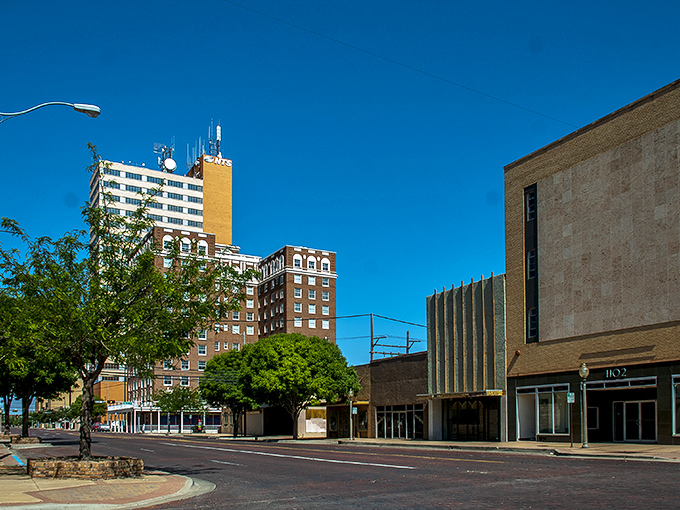 Downtown Lubbock stretches toward the endless Texas sky, where historic brick buildings stand proudly against modern additions. The perfect backdrop for a barbecue pilgrimage.