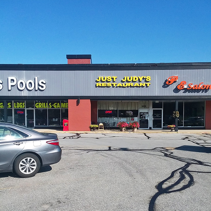The yellow sign beckons like a lighthouse for the breakfast-starved. Just Judy's unpretentious exterior promises what fancy brunch spots often forget: actual satisfaction.