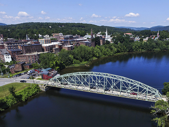 Brattleboro's skyline unfolds like a storybook village, where church steeples and historic buildings nestle between Vermont's rolling hills and the Connecticut River.