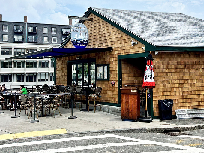 The unassuming cedar-shingled exterior of Boston Sail Loft stands like a maritime treasure chest waiting to be discovered. Nautical charm in architectural form!