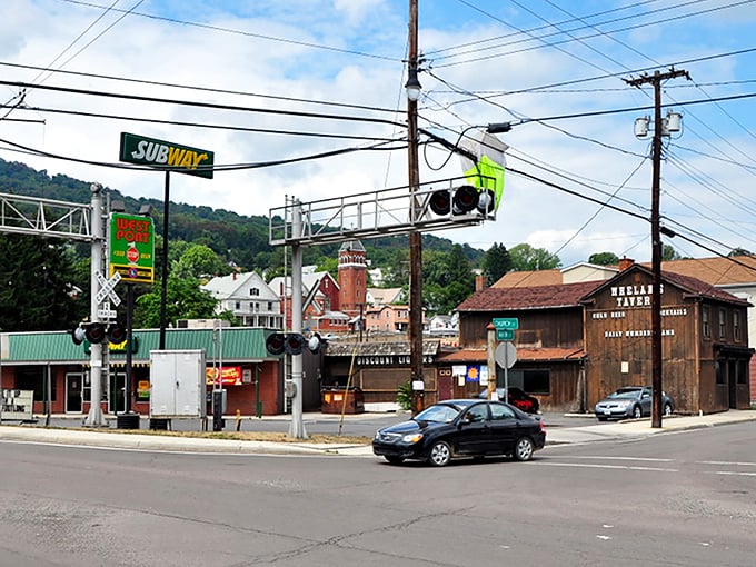 The intersection of Main Street showcases Westernport's practical charm&mdash;Subway meets local tavern in a town where utility trumps pretense and your retirement dollars stretch further.