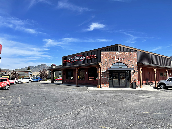 Silver Bow Pizza Parlor's welcoming brick exterior stands against Montana's big sky, inviting hungry visitors to discover Butte's beloved culinary treasure.