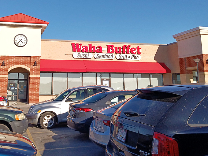 The bright red awning of Waha Buffet beckons like a culinary lighthouse, promising a voyage across oceans of flavor without leaving Wisconsin.