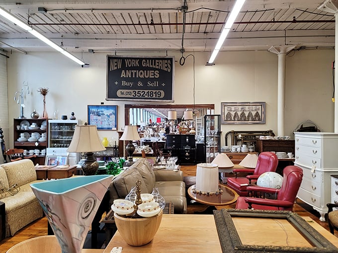 Mid-century furniture mingles with antique treasures in this elegantly curated space. That red leather chair is practically begging you to sit down.