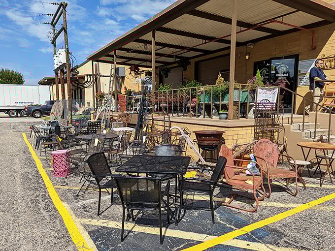 Garden treasures await! The outdoor display at Palmetto Peddlers features vintage patio furniture where you could imagine sipping sweet tea while plotting your next antiquing adventure.