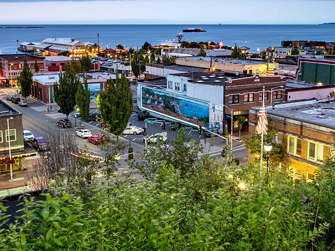 Twilight descends on Port Angeles, transforming the waterfront into a postcard where mountains, sea, and city lights perform a perfect three-part harmony.