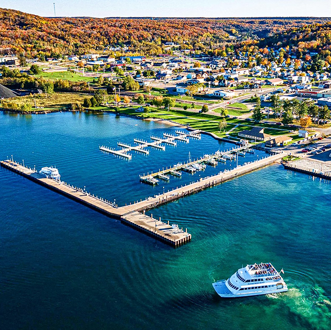 Munising's harbor sparkles like a Caribbean getaway that somehow landed in Michigan's Upper Peninsula, complete with tour boats ready to show off those famous painted cliffs.
