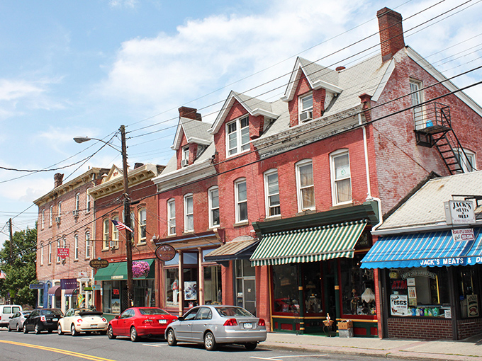 Historic brick buildings line New Paltz's Main Street, where small-town charm meets big personality in a colorful architectural parade.