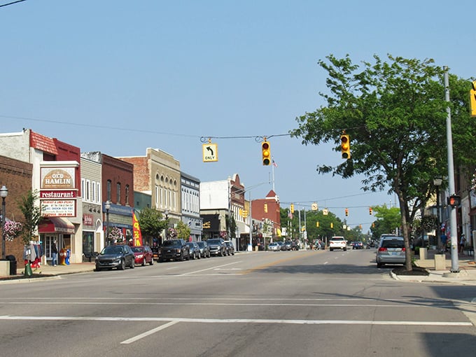 Downtown Ludington stretches before you like a Norman Rockwell painting come to life, where every storefront has a story and every awning offers shelter from both rain and reality.