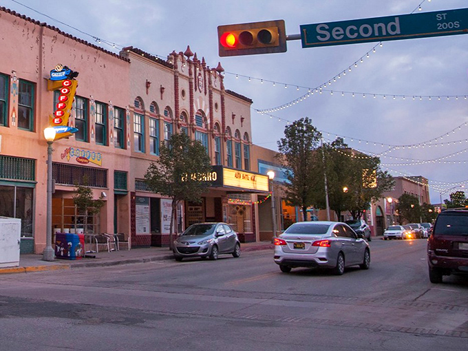 As dusk settles on Coal Avenue, Gallup's historic buildings glow with warm light, showcasing the charm that makes this affordable city so appealing.