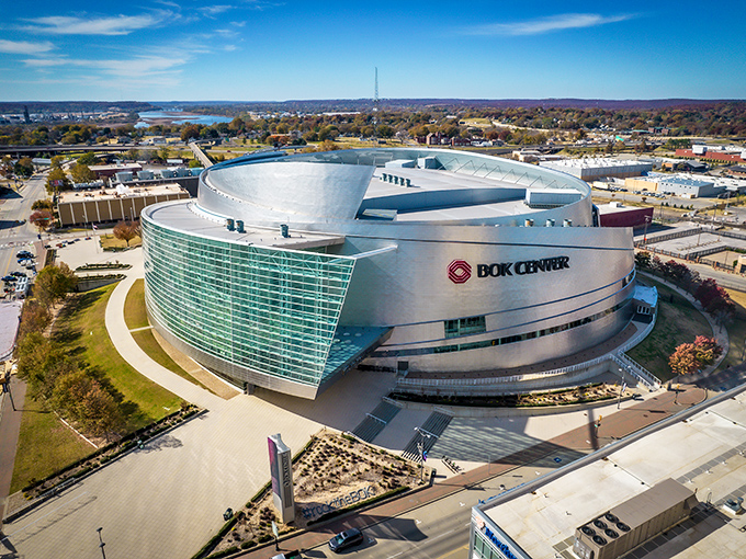 The BOK Center's sweeping curves and glass fa&ccedil;ade shimmer like a futuristic silver spaceship that chose Tulsa for its landing spot.