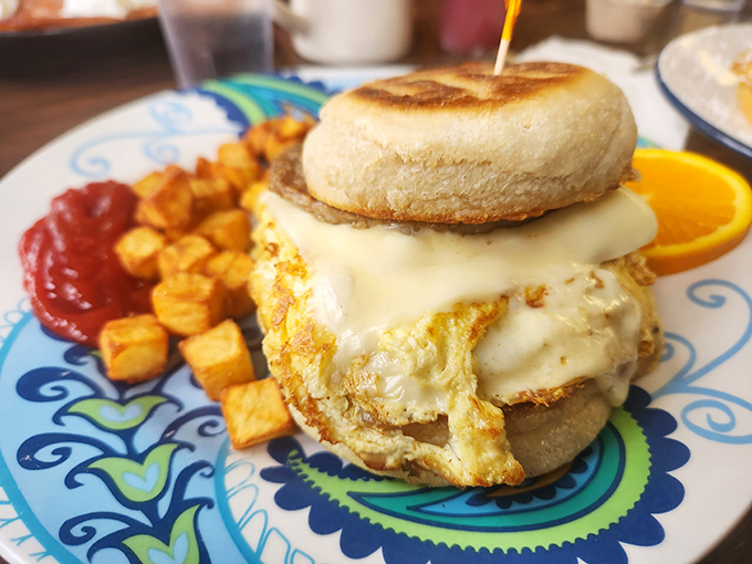 The breakfast sandwich that graduated with honors—English muffin, melty cheese, and an egg that clearly knows its purpose in life.