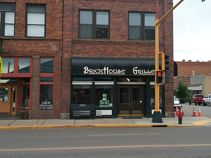 Brickhouse Grille's classic storefront promises comfort food that makes you wonder why you ever bothered with those fancy big-city restaurants anyway.