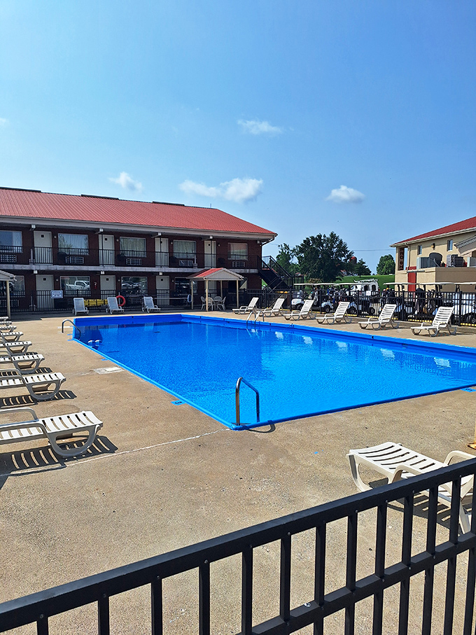 Nothing says "vacation" quite like a sparkling blue pool surrounded by lounge chairs, promising a refreshing dip after a day of historical exploration.