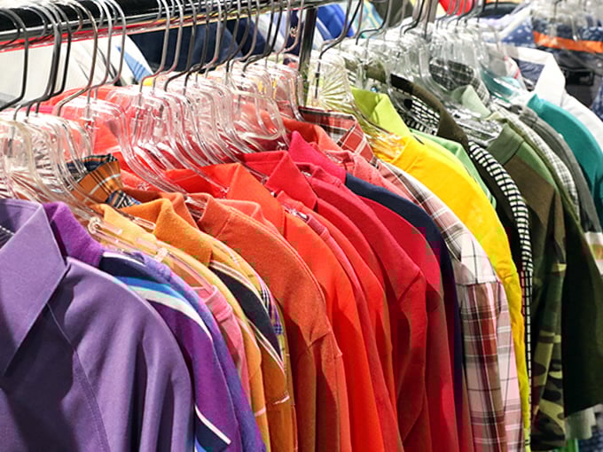A rainbow of shirts arranged by color &ndash; proof that organization can be both practical and visually delicious.