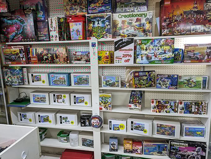 LEGO sets through the decades line these shelves, each box containing both building blocks and powerful nostalgia triggers for grown-ups who never quite grew up.