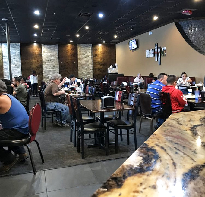 Weekend warriors and buffet veterans alike gather in this modern dining space, united by the universal language of "just one more plate."