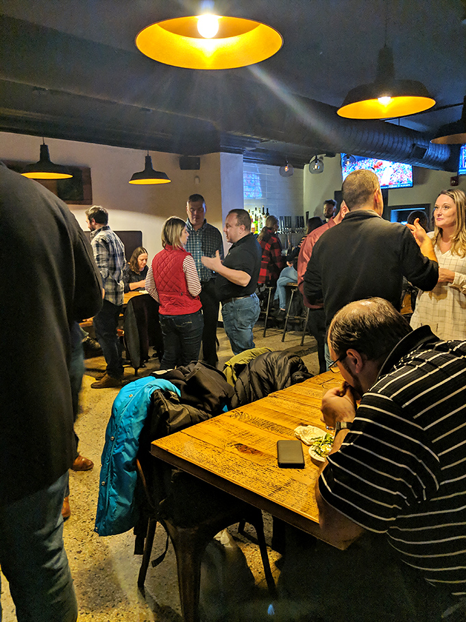 The true measure of a great tavern isn't just in its food but in the symphony of conversations filling the space on a busy night.