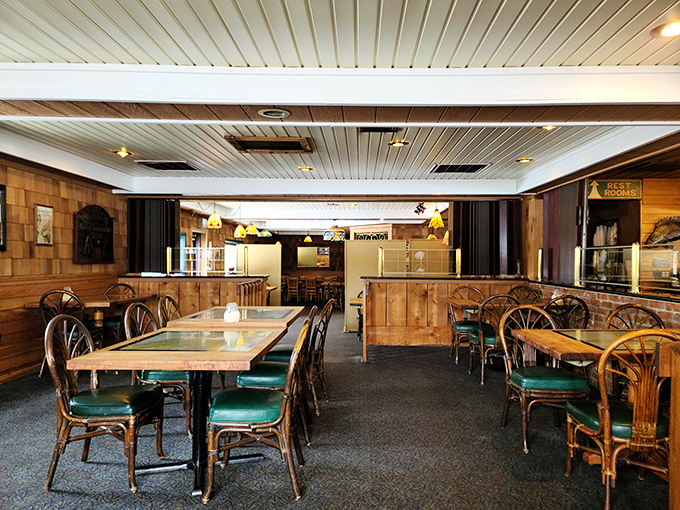 The dining room's rattan chairs and wooden tables offer a comfortable spot to drop anchor for a meal. Maritime charm without the seasickness.