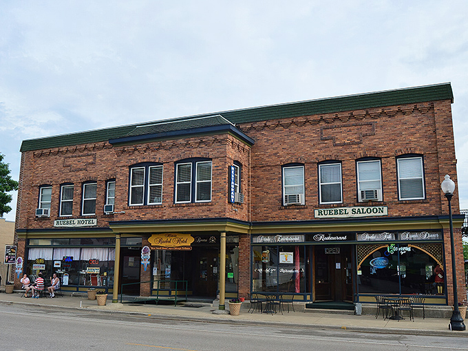 The Ruebel Hotel has welcomed river travelers since 1879. Its brick fa&ccedil;ade and saloon have witnessed over a century of Grafton's evolving story.