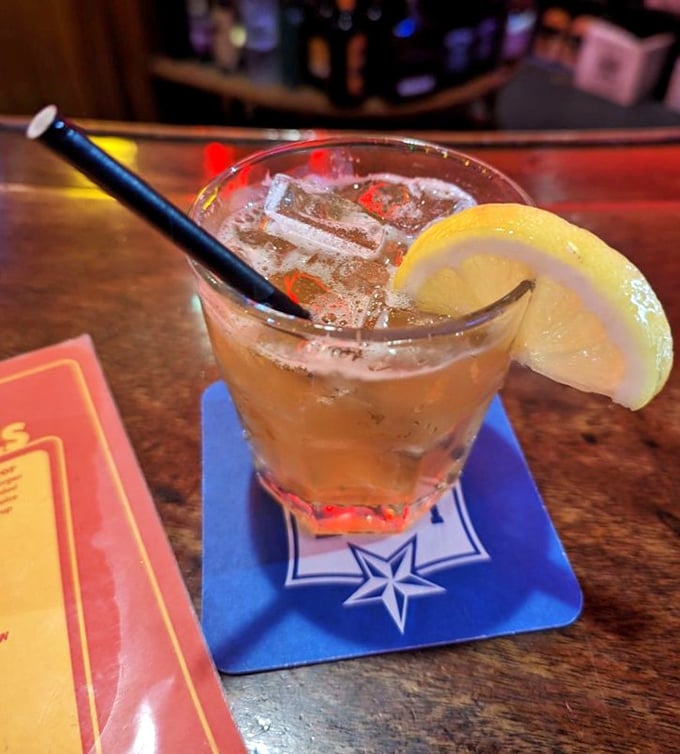 That's not just a cocktail&mdash;it's liquid refreshment that perfectly cuts through the richness of your hot dog adventure. The lemon wedge adds that touch of class.